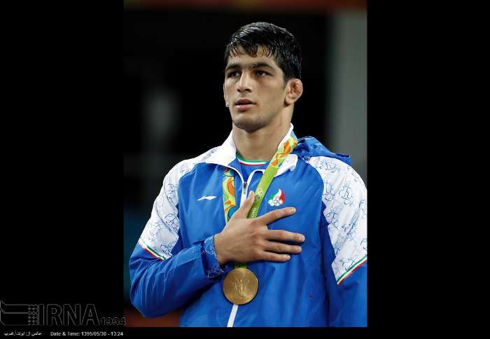 IRNA English - Iranian freestyle wrestler wins gold medal in Olympics