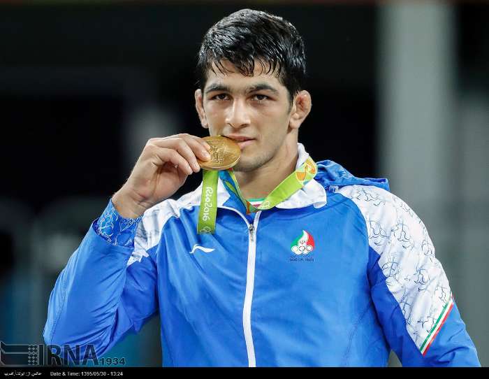 IRNA English - Iranian freestyle wrestler wins gold medal in Olympics