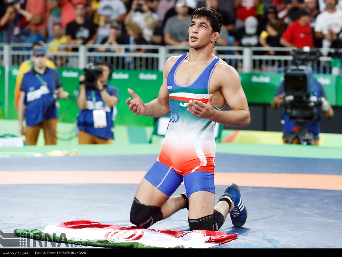 IRNA English - Iranian freestyle wrestler wins gold medal in Olympics