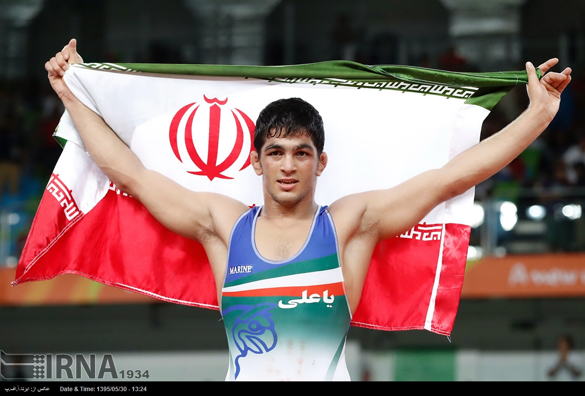 IRNA English - Iranian freestyle wrestler wins gold medal in Olympics