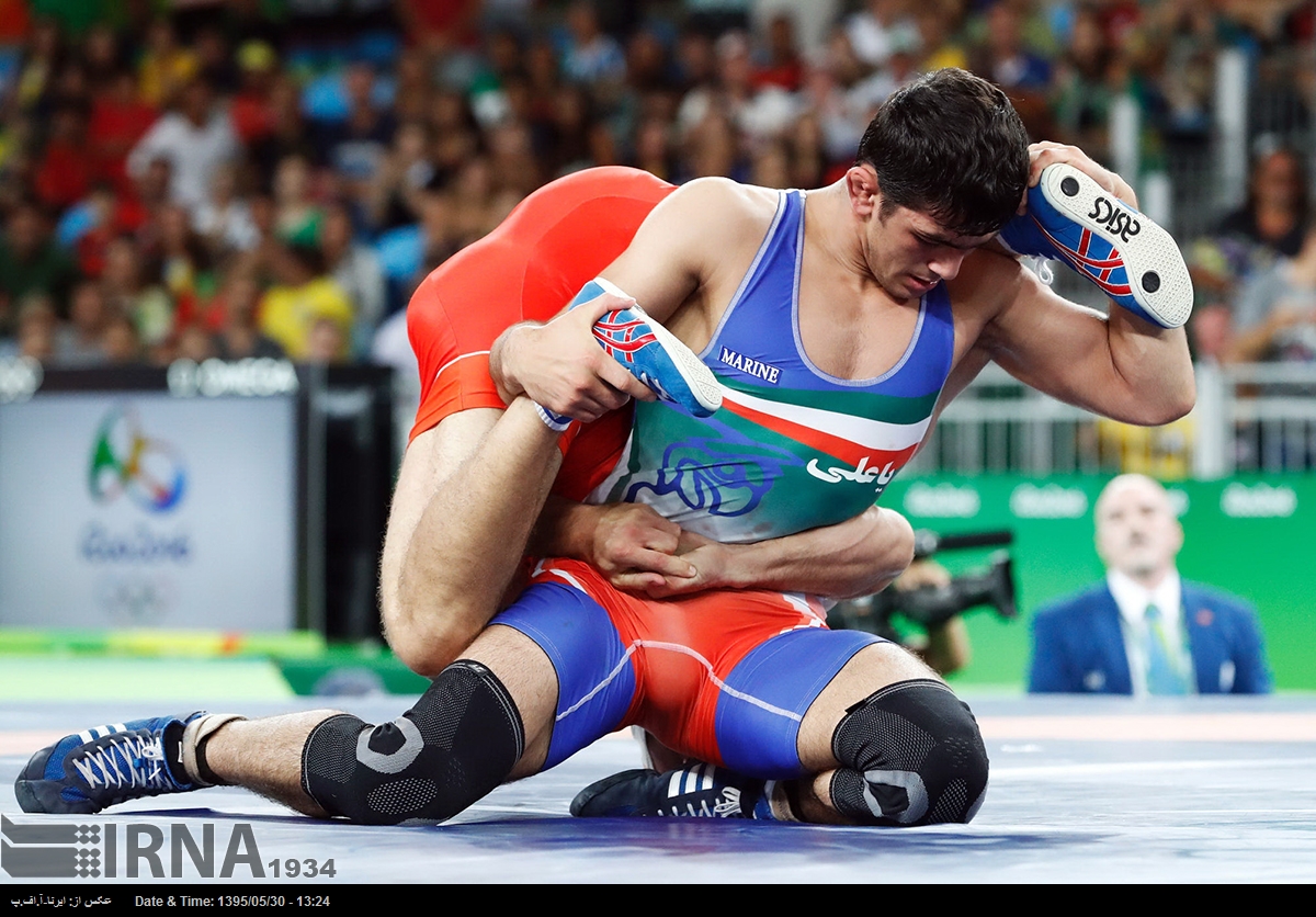 IRNA English - Iranian freestyle wrestler wins gold medal in Olympics