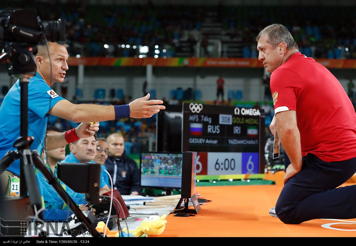 IRNA English - Iranian freestyle wrestler wins gold medal in Olympics