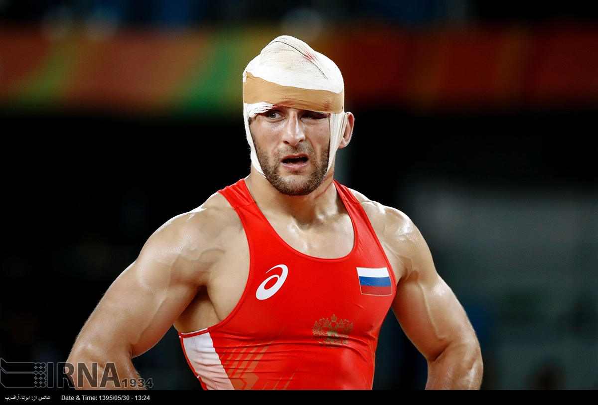 IRNA English - Iranian freestyle wrestler wins gold medal in Olympics