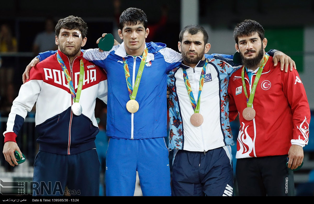 IRNA English - Iranian freestyle wrestler wins gold medal in Olympics