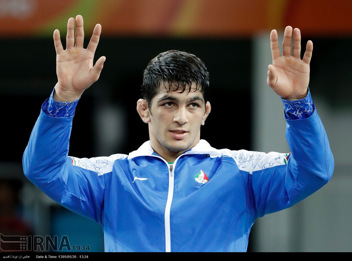 IRNA English - Iranian freestyle wrestler wins gold medal in Olympics
