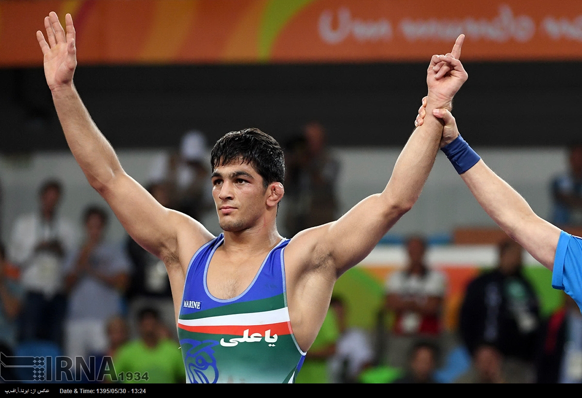 IRNA English - Iranian freestyle wrestler wins gold medal in Olympics