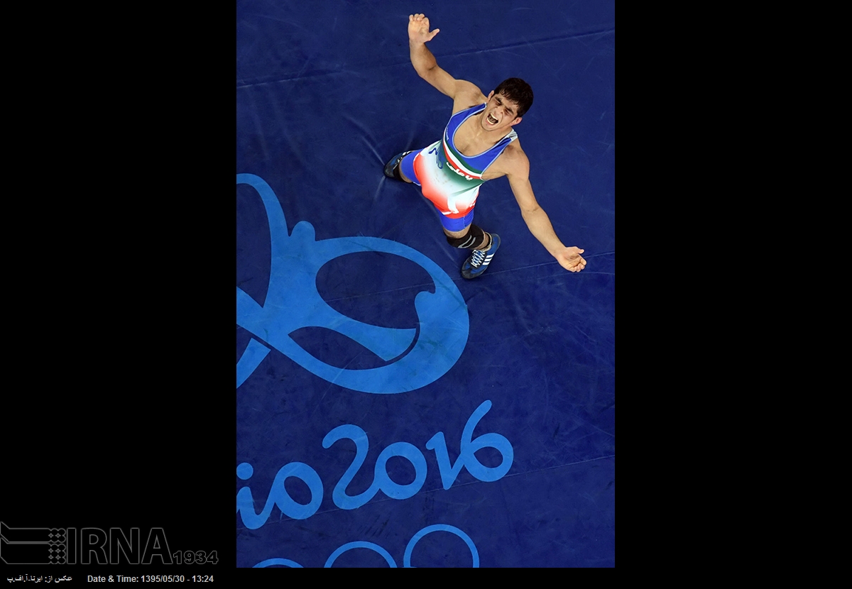 IRNA English - Iranian freestyle wrestler wins gold medal in Olympics